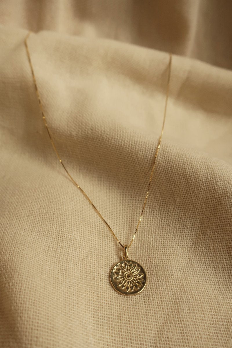 Gold Marigold Charm Necklace | All About Audrey – All About Audrey ...
