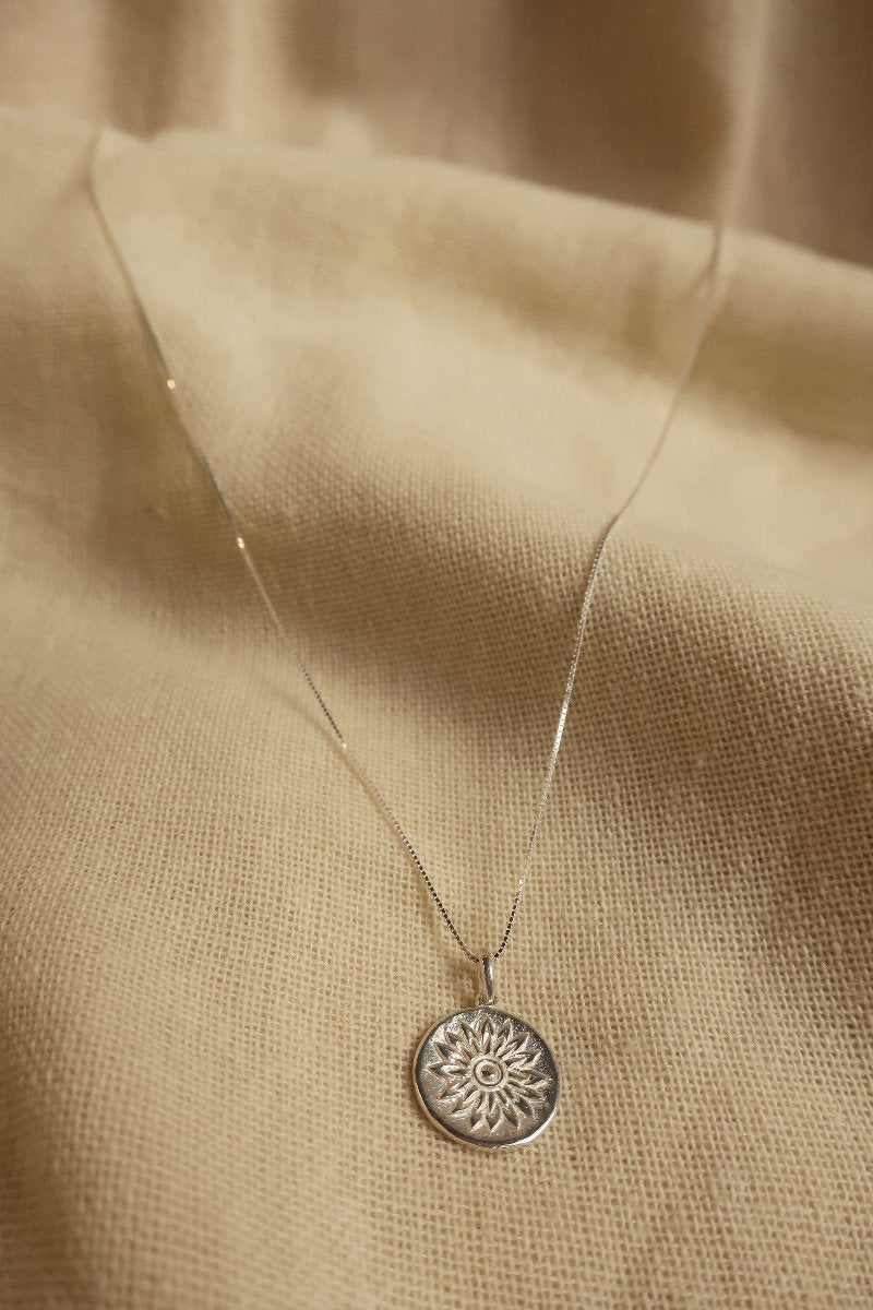 Silver Marigold Charm Necklace | All About Audrey – All About Audrey ...